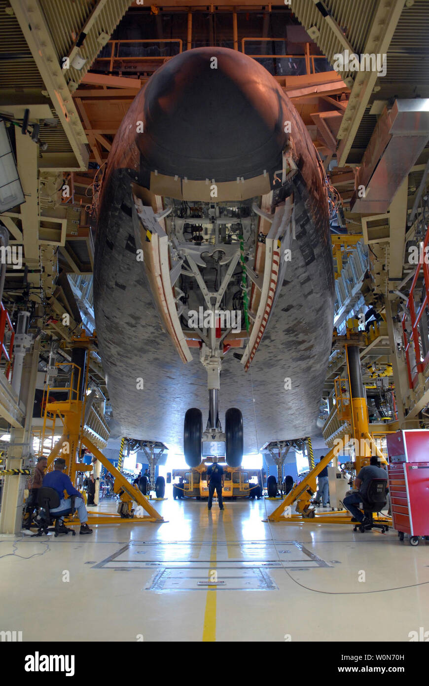 In the Orbiter Processing Facility at NASA's Kennedy Space Center, the ...