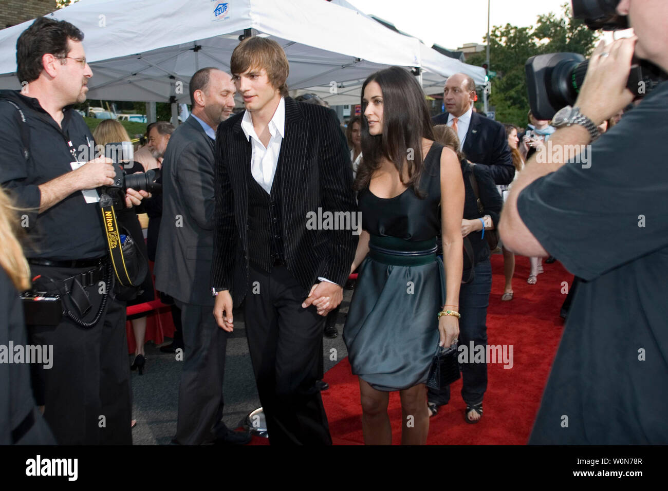 Ashton Kutcher and wife, Demi Moore attend the world premiere of "The ...