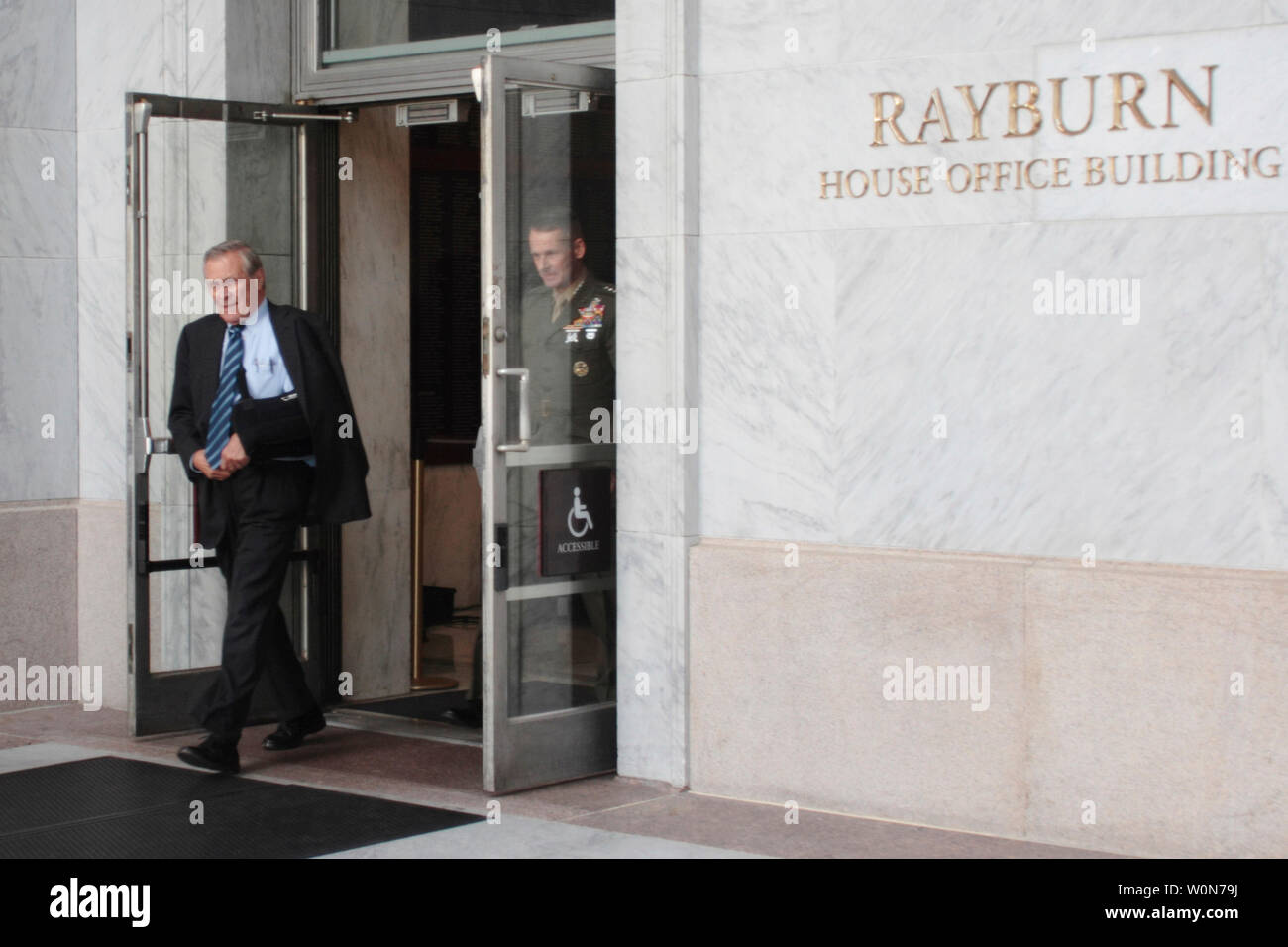 US Secretary of Defense Donald Rumsfeld departs the Rayburn House ...