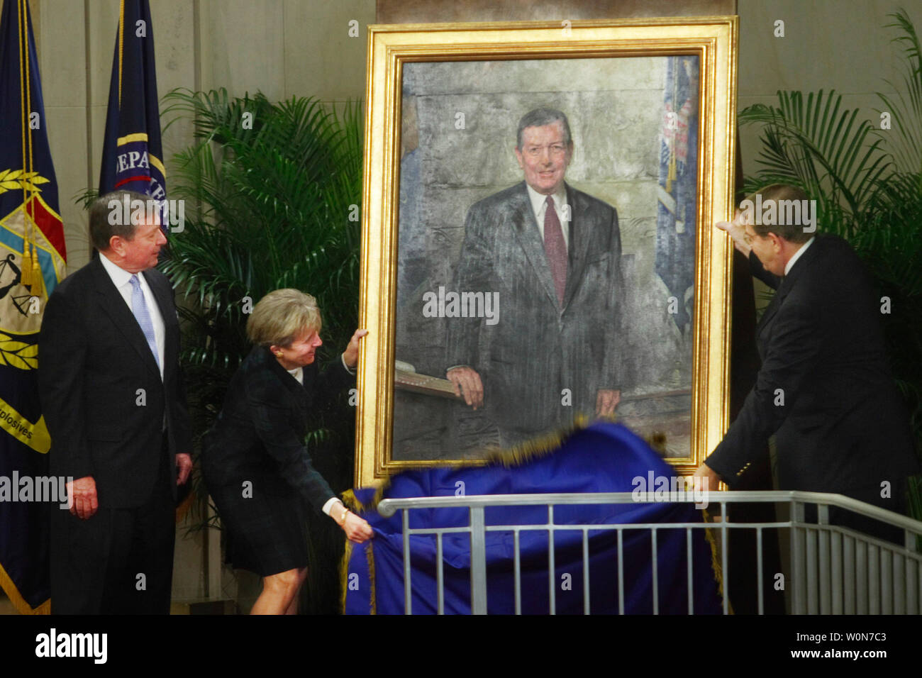Former U.S. Attorney General John Ashcroft (L) watches as his wife ...