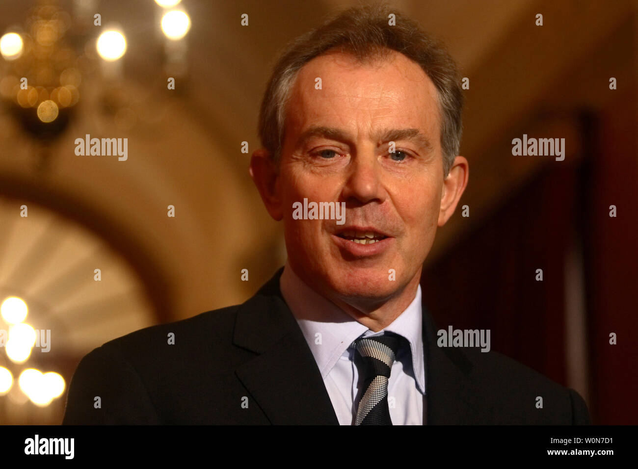 British Prime Minister Tony Blair speaks to members of press on ...