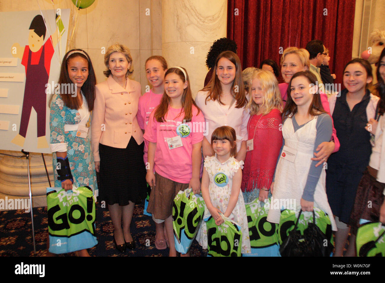 Sen. Kay Bailey Hutchison (R-TX) (R) poses with children during "Take ...
