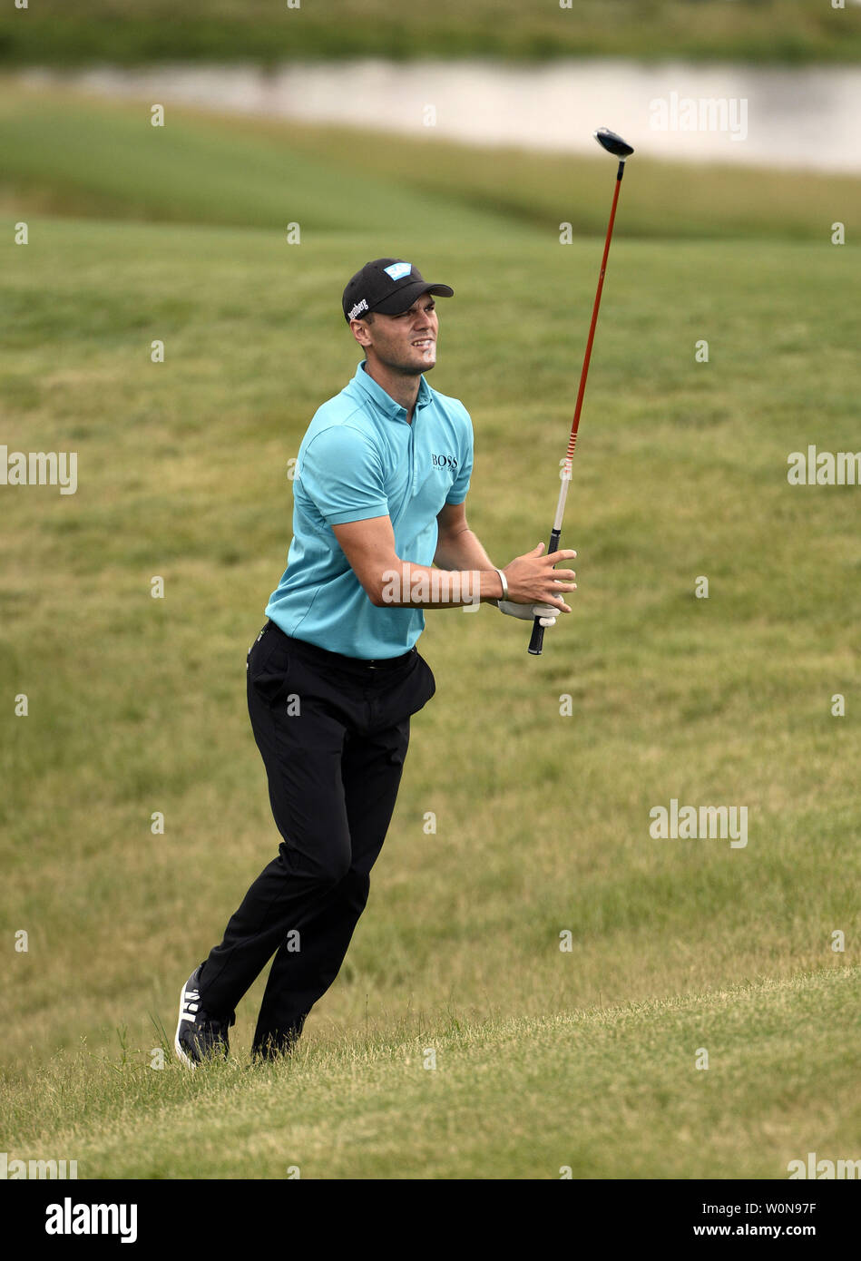 Martin Kaymer hits his approach shot on the 10th hole during round 3 of ...