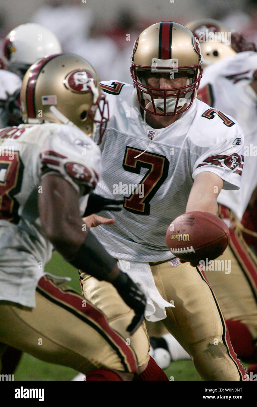 San Francisco 49ers' quarterback Ken Dorsey hands off on a running play ...