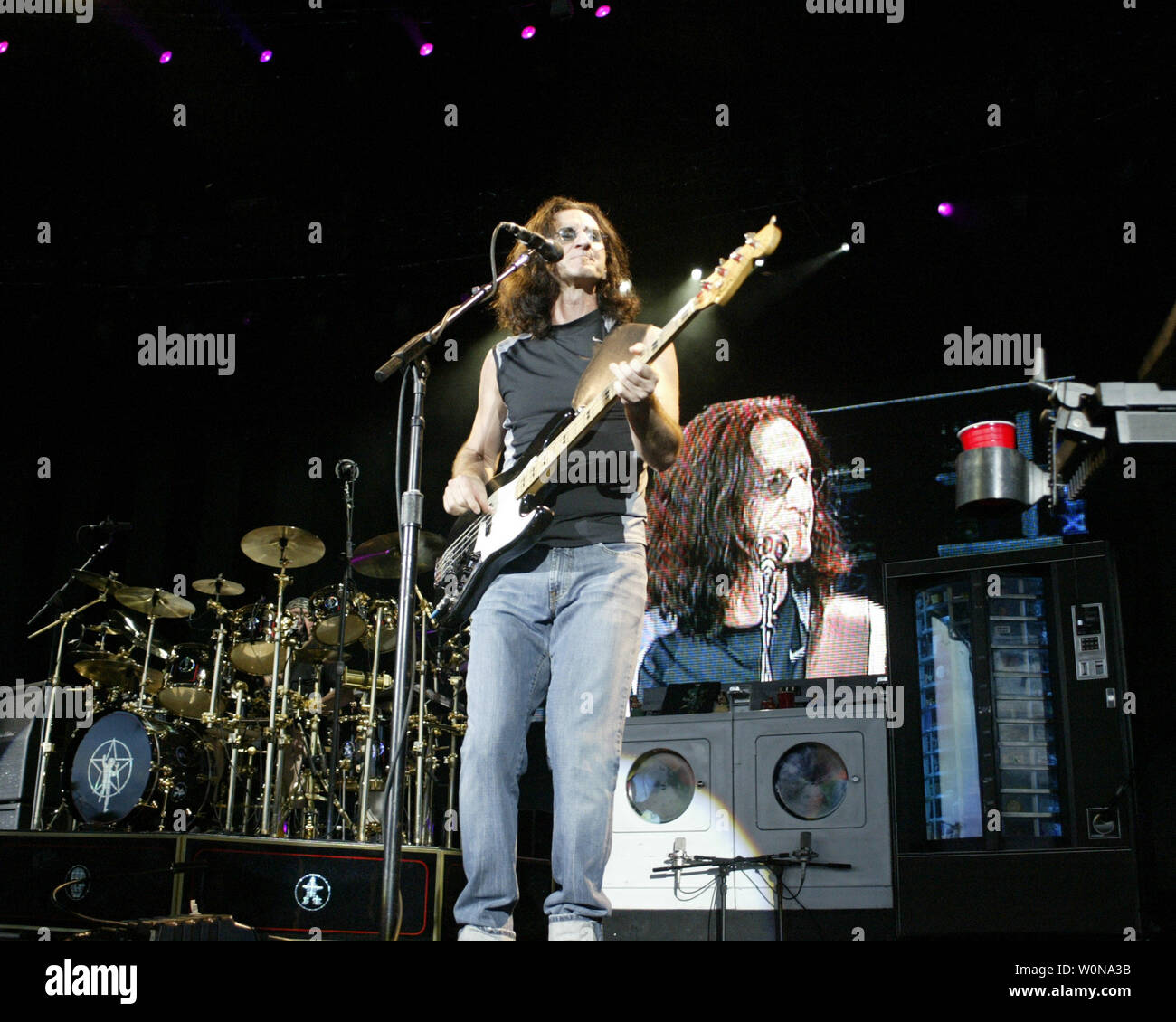 Geddy Lee with Rush performs in concert, at the Sound Advice ...