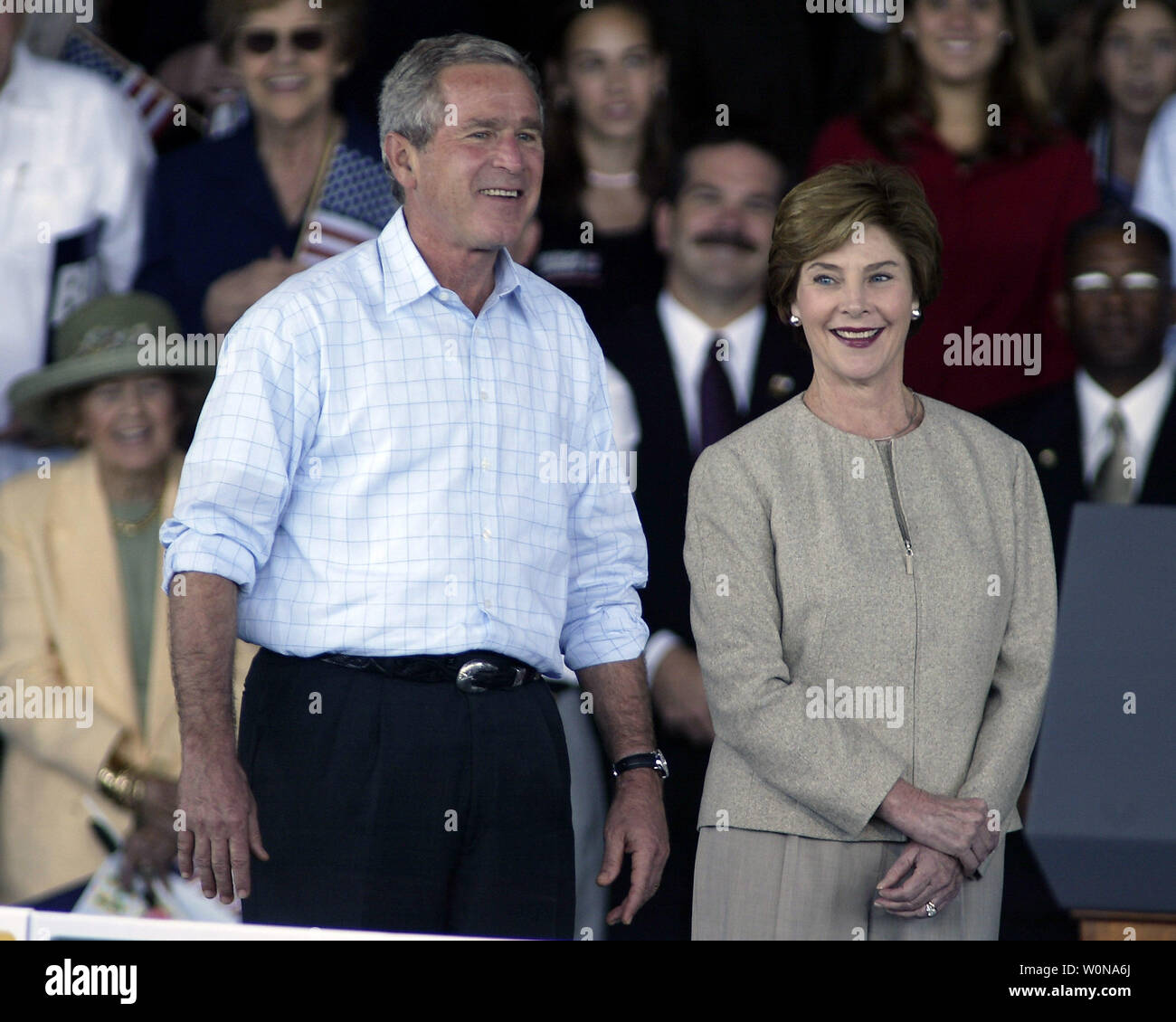 President George W Bush with his wife First lady Laura Bush speak at a ...
