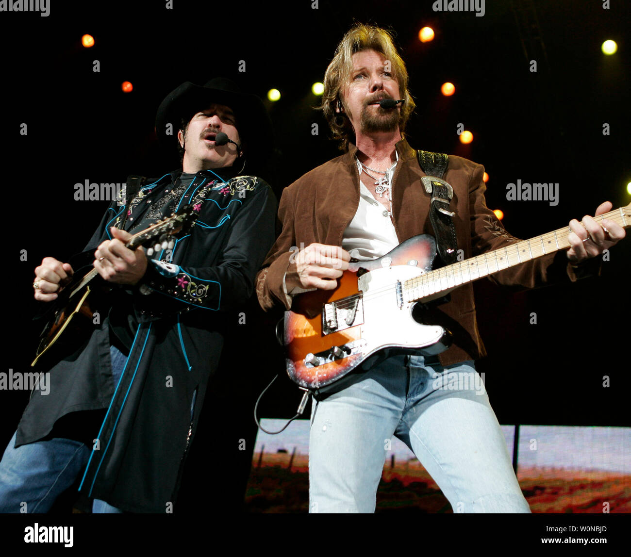 Kix Brooks(L) and Ronnie Dunn of Brooks and Dunn perform in concert, at ...