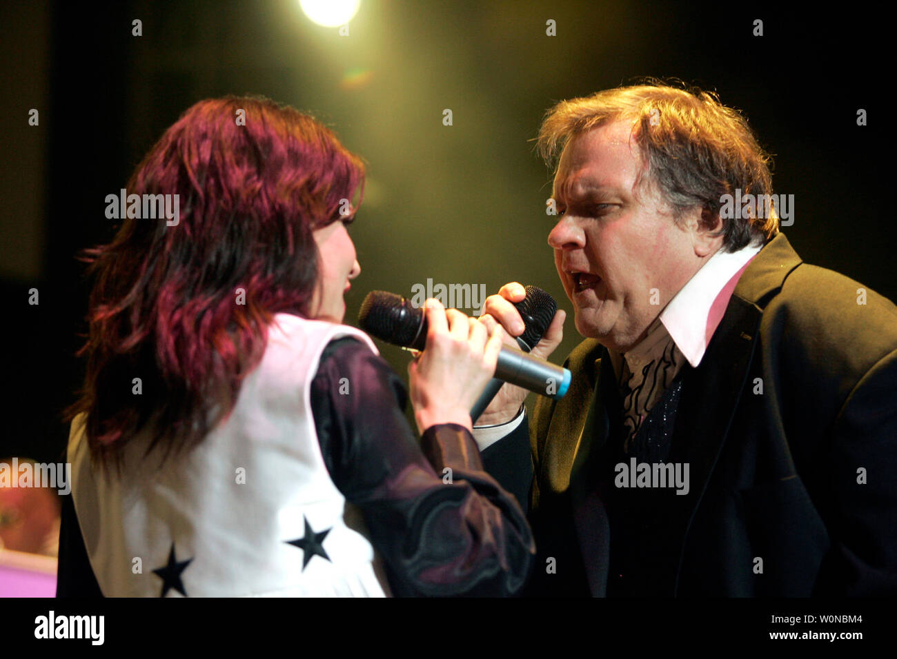 Meat Loaf (R) and Aspen Miller perform in concert at the Mizner Park ...