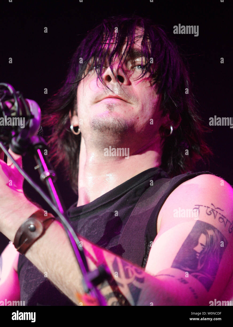 Adam Gontier with Three Days Grace performs in concert during the Buzz ...
