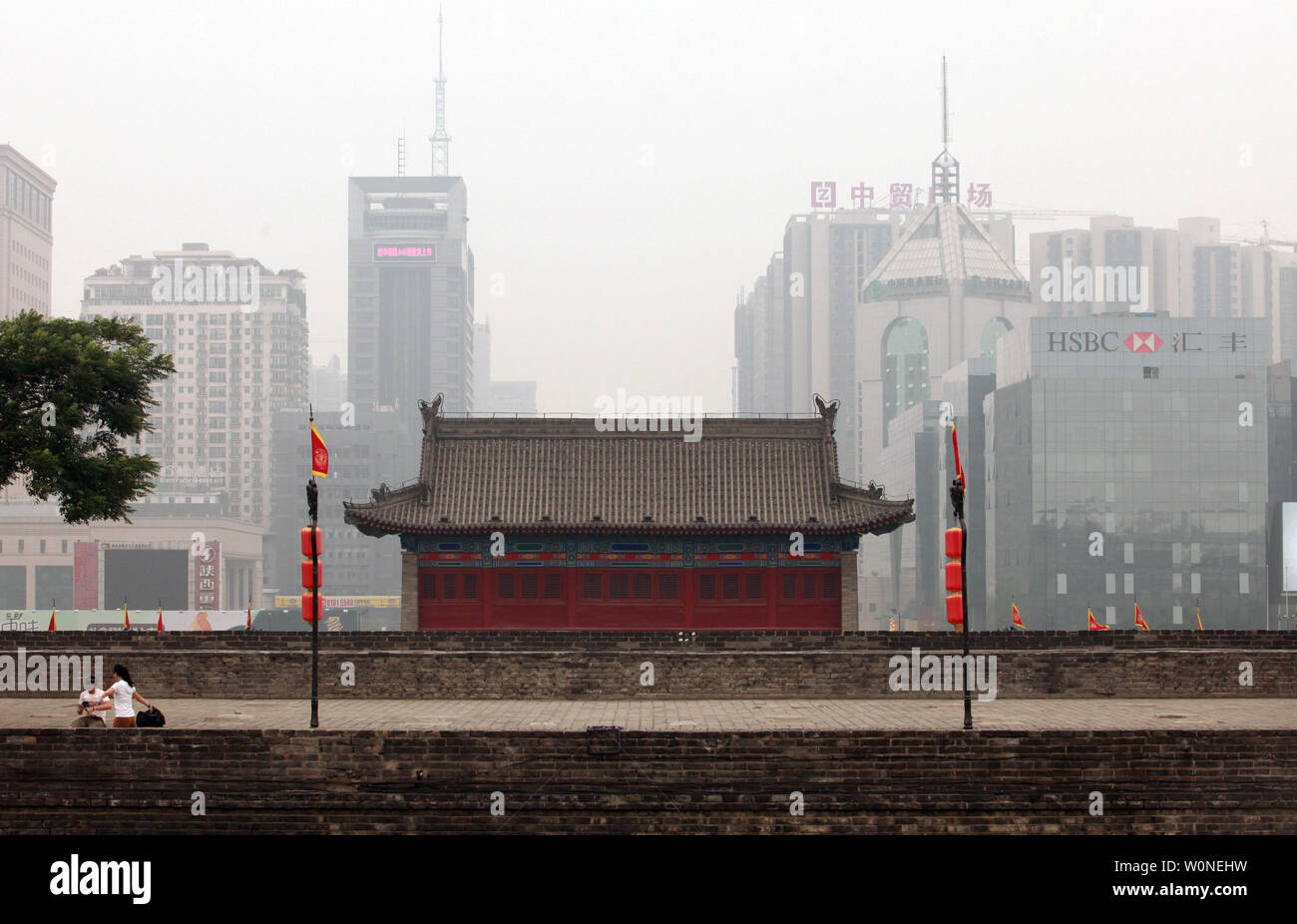 Modern residential and commercial buildings dominate the skyline next ...