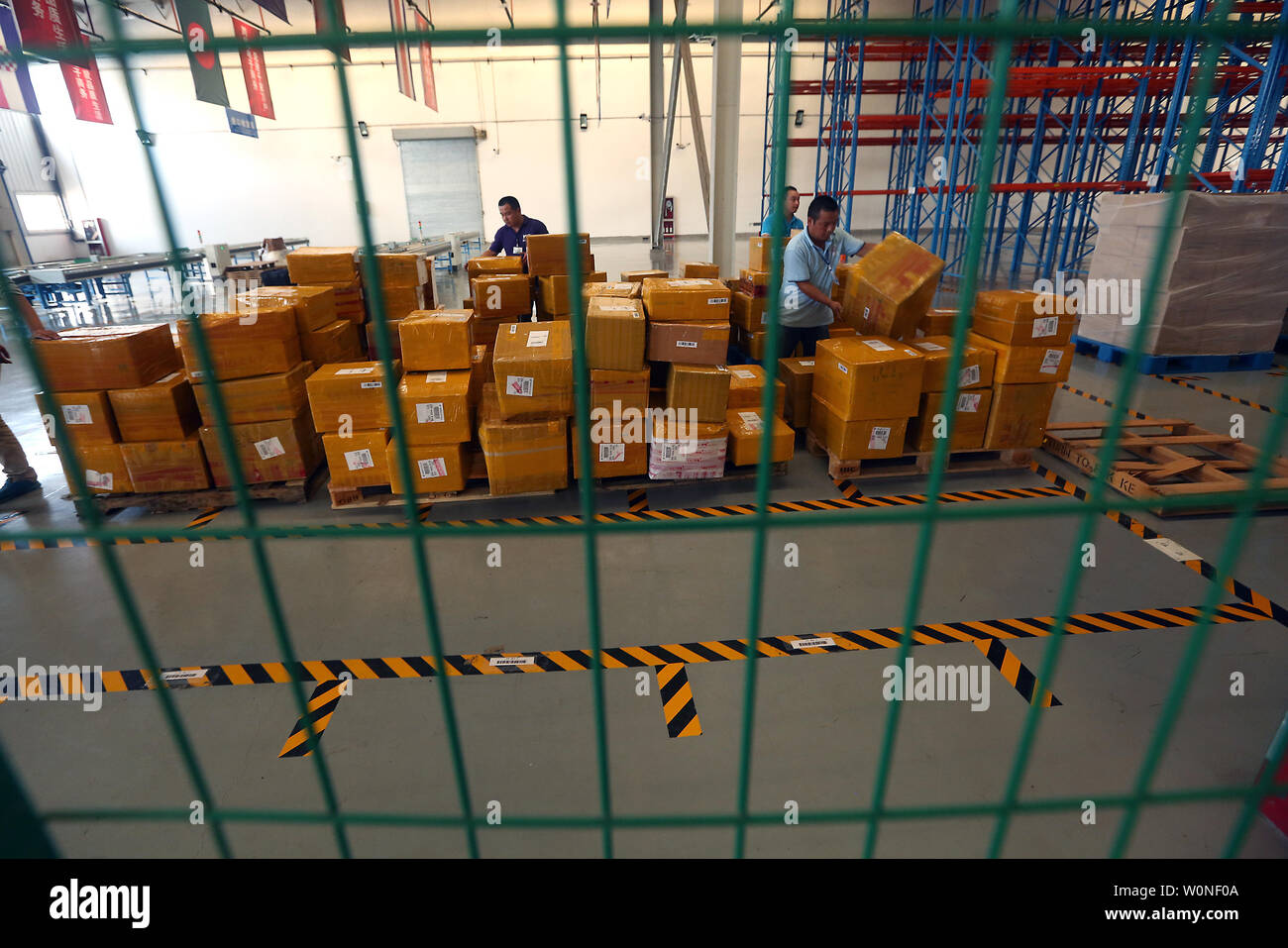 Foreign correspondents get a behind the scenes look at packages being ...