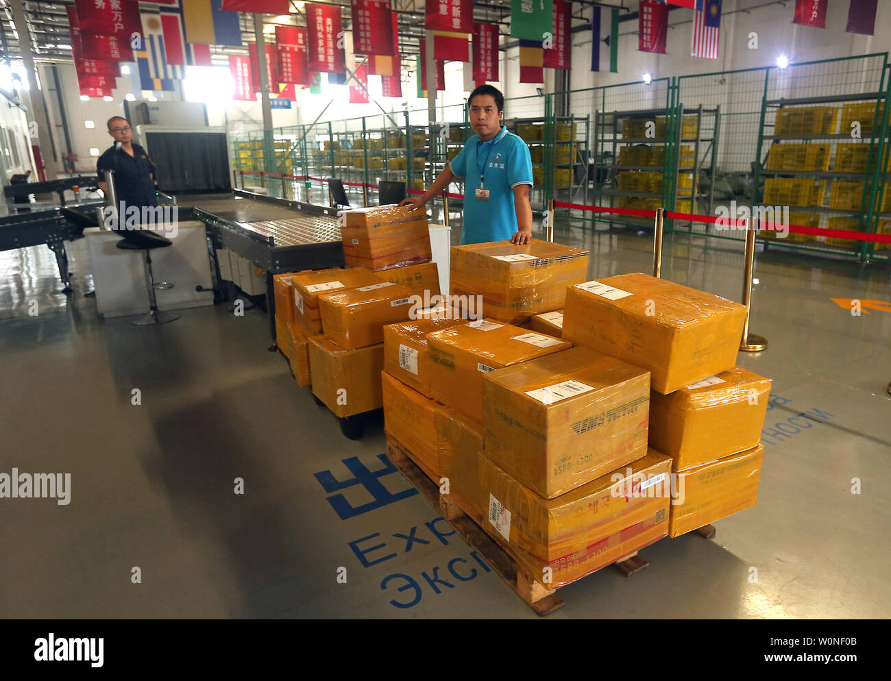 Foreign correspondents get a behind the scenes look at packages being ...