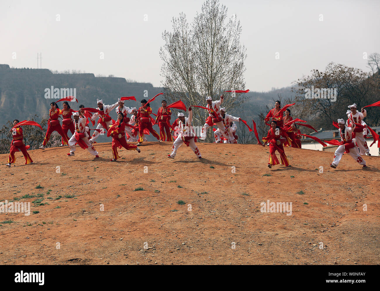 Chinese from surrounding villages perform the famous Ansai Waist Drum ...