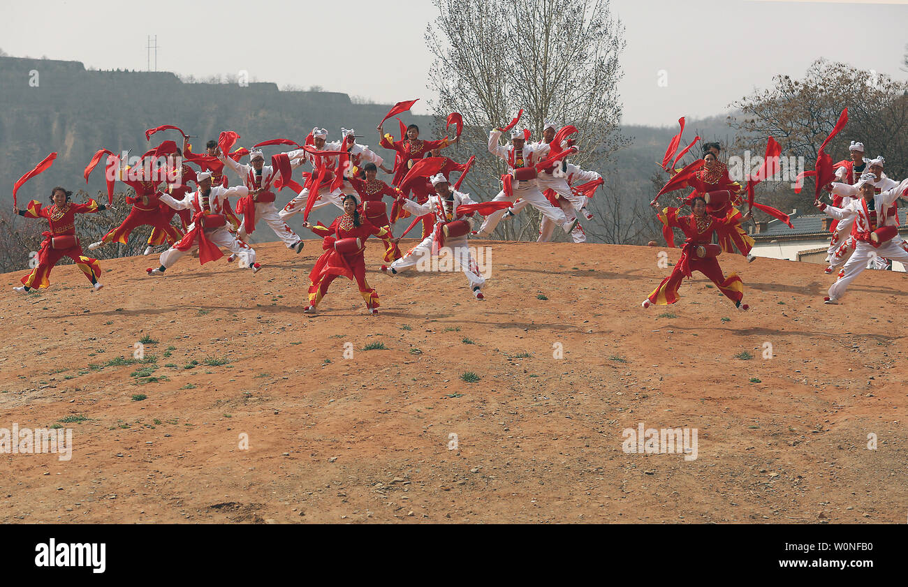 Chinese from surrounding villages perform the famous Ansai Waist Drum ...