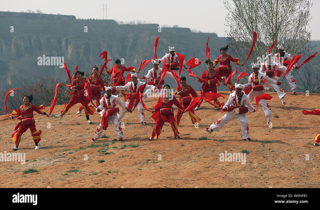 Chinese from surrounding villages perform the famous Ansai Waist Drum ...