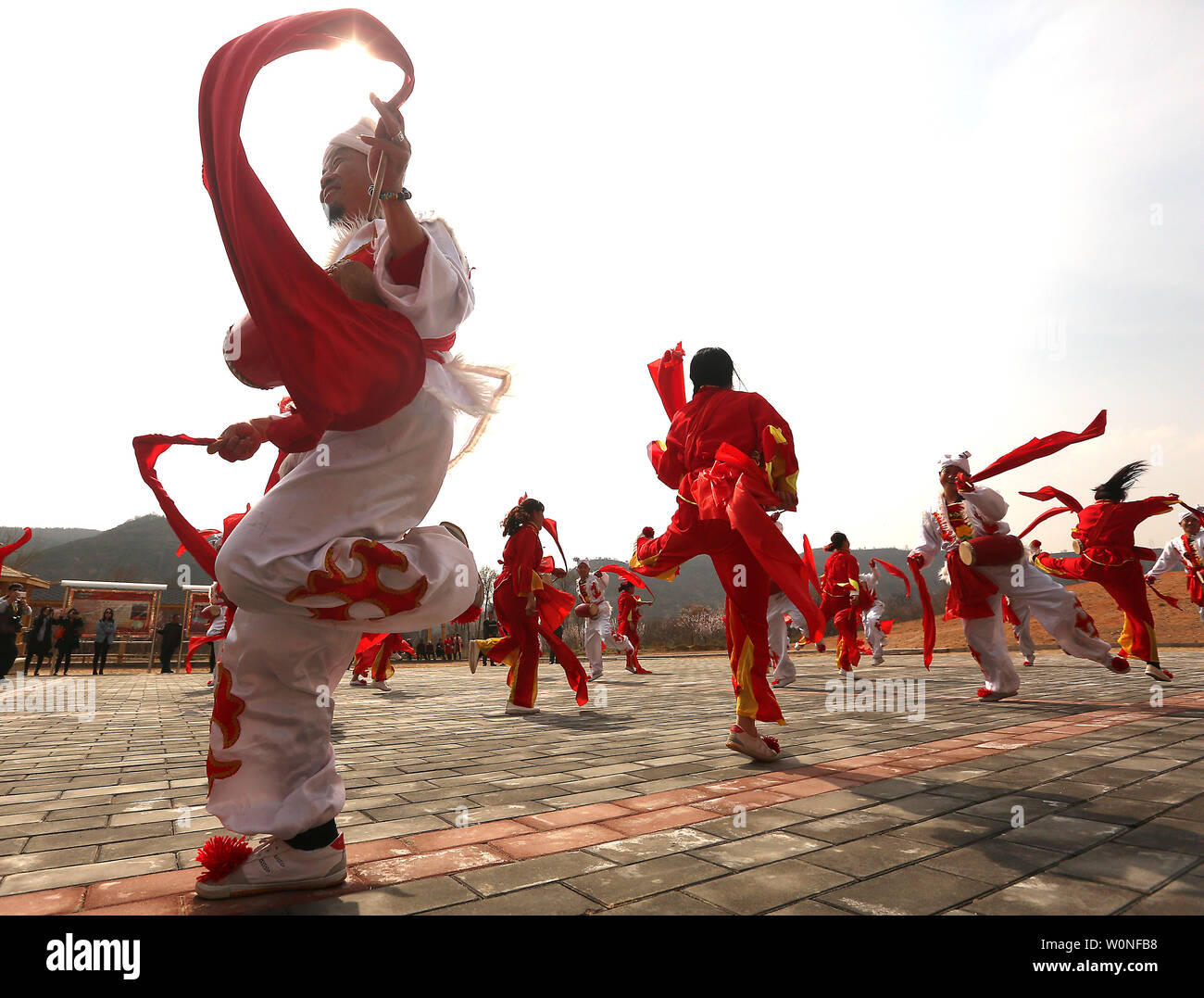 Chinese from surrounding villages perform the famous Ansai Waist Drum ...