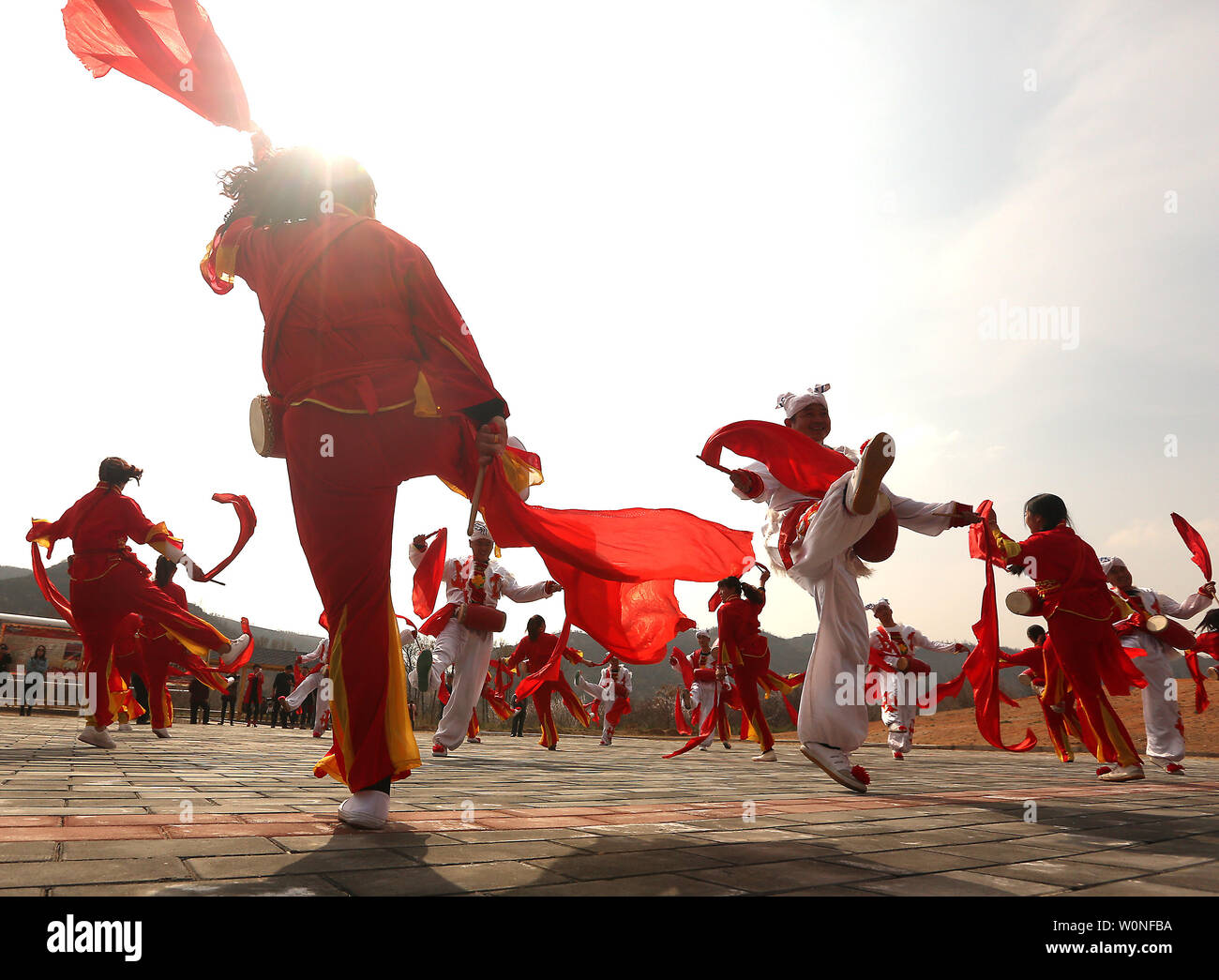 Chinese from surrounding villages perform the famous Ansai Waist Drum ...