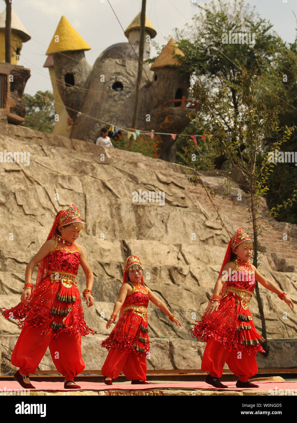Female dwarves dance to a Moroccan tune during a twice-daily ...