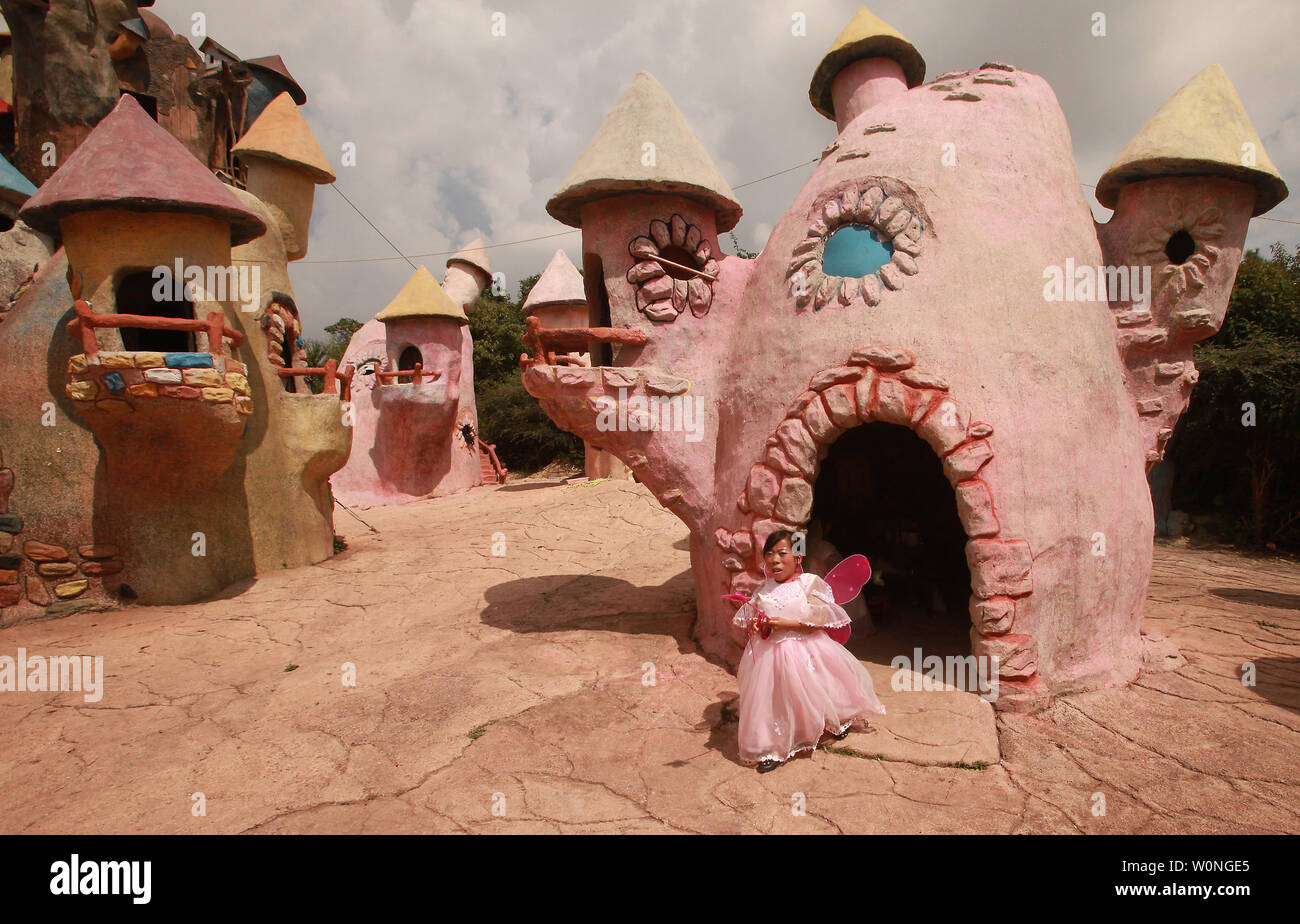 A fairy dwarf walks to the opening of a show featuring dwarves singing ...