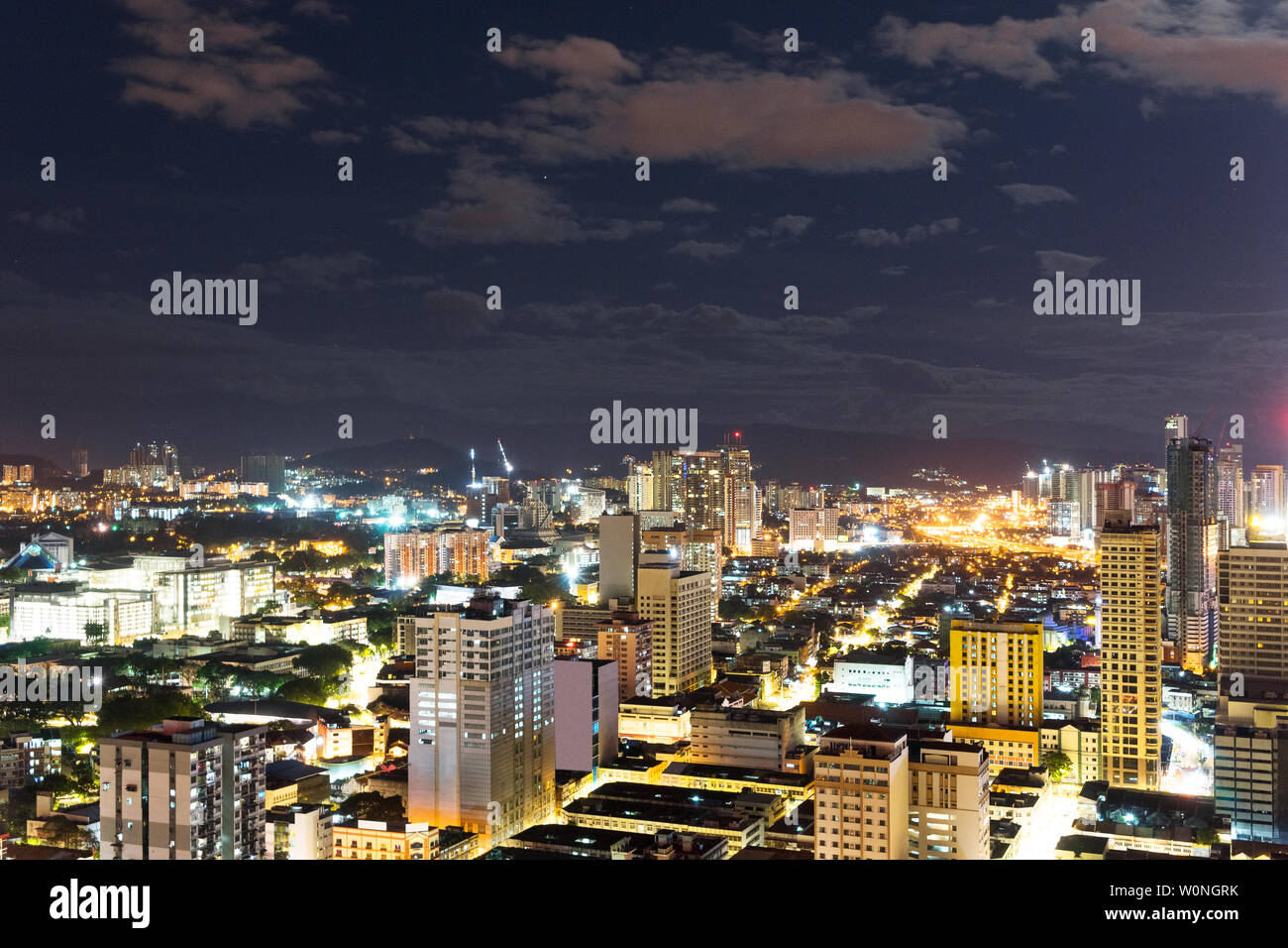 Cityscape of modern city at night Stock Photo - Alamy