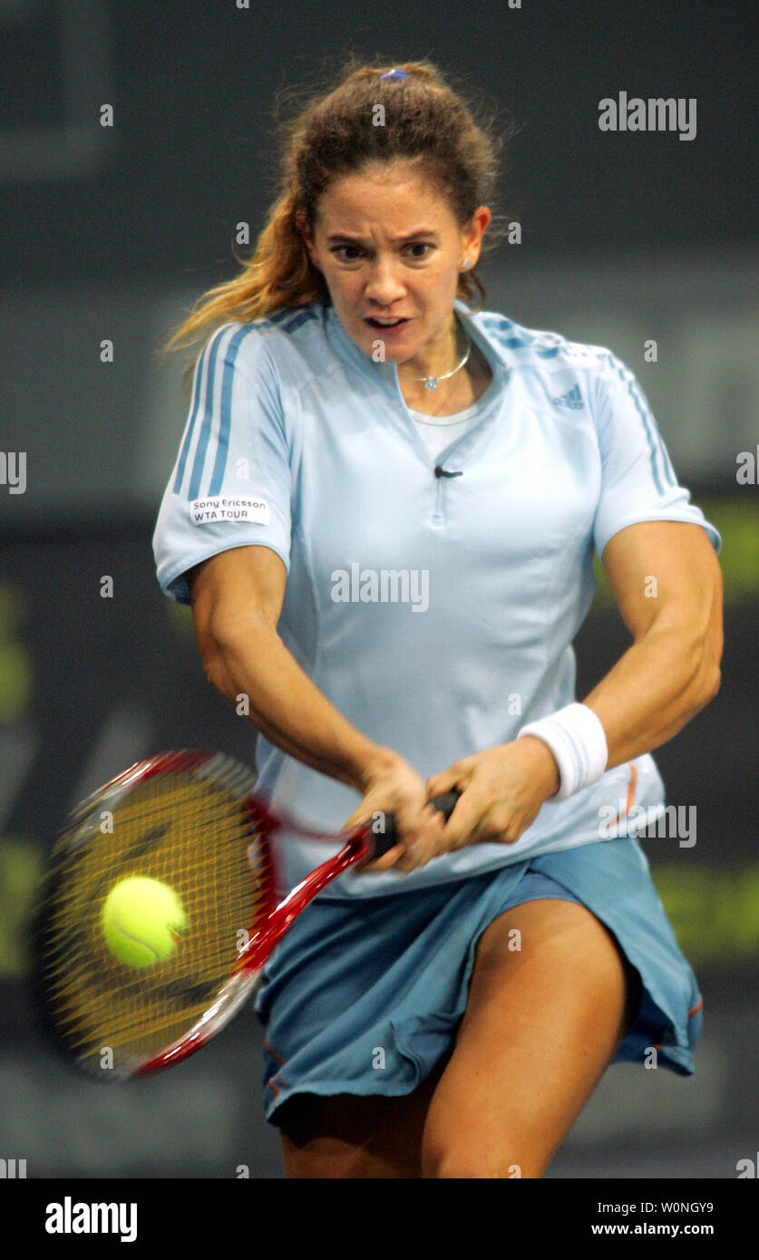 Patty Schnyder of Switzerland connects with a backhand return during ...