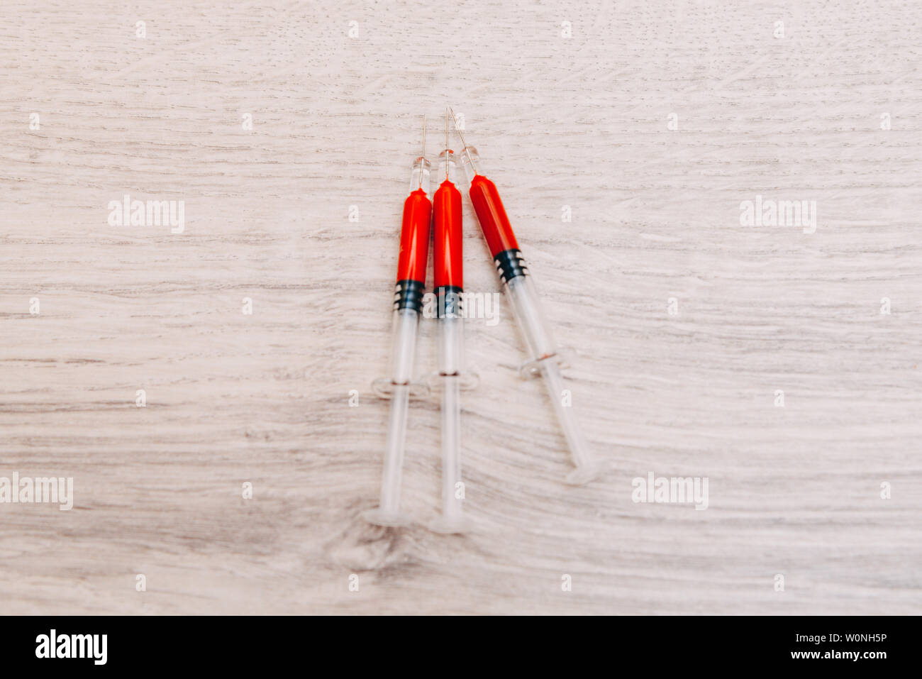 Treatment against addiction. Syringe with blood. Immunodeficiency ...
