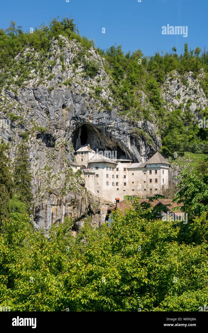 Predjama castle built into a cave in Slovenia Stock Photo - Alamy