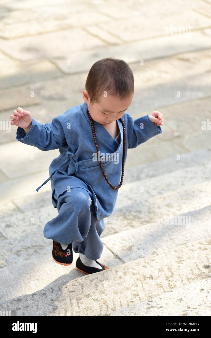 Cute little monk Stock Photo - Alamy
