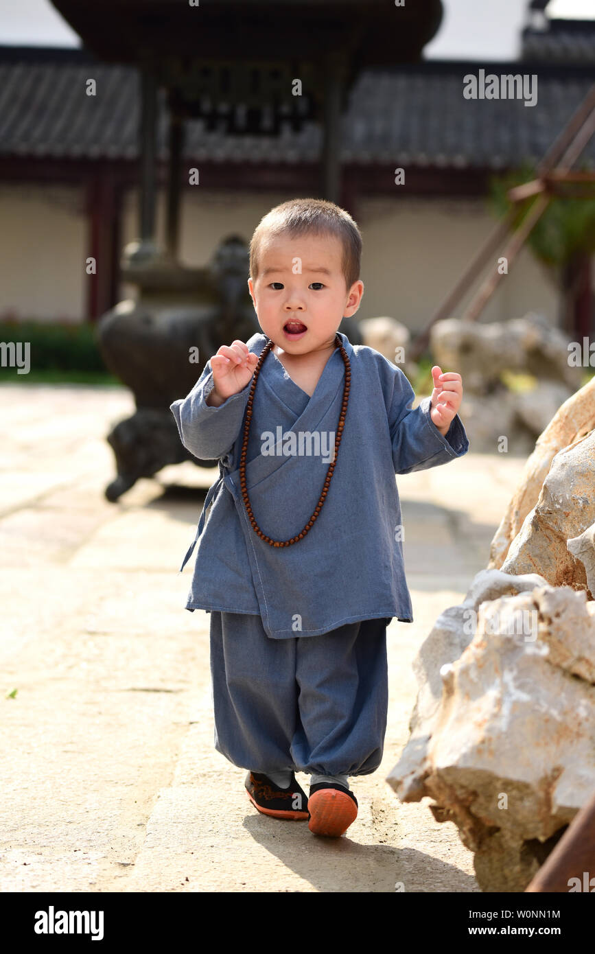 Cute little monk hi-res stock photography and images - Alamy