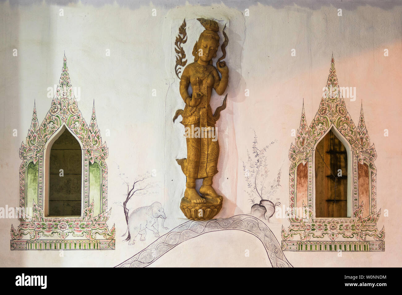 Thai street Buddhist niches Stock Photo - Alamy