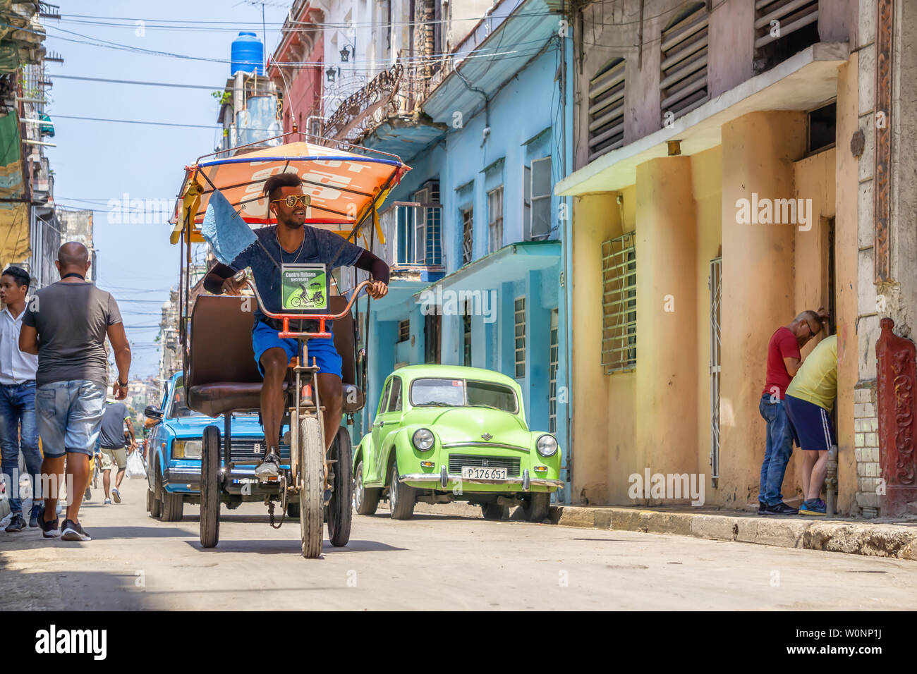 Havana, Cuba - May 16, 2019: Bicycle Taxi Driver in the street of Old ...