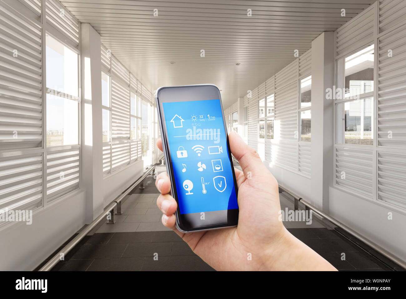 smart phone with smart home and modern corridor Stock Photo - Alamy