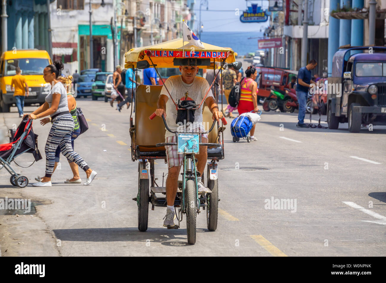 Havana, Cuba - May 16, 2019: Bicycle Taxi Driver in the street of Old ...