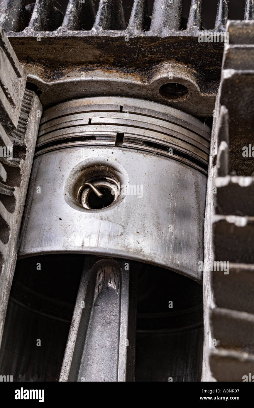 Piston of an internal combustion engine in a cut aluminum cylinder ...