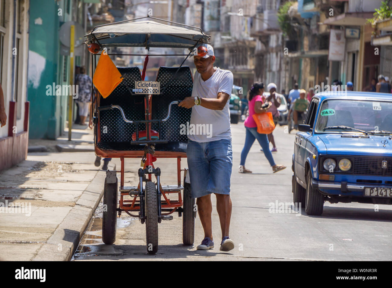 Havana, Cuba - May 16, 2019: Bicycle Taxi Driver in the street of Old ...