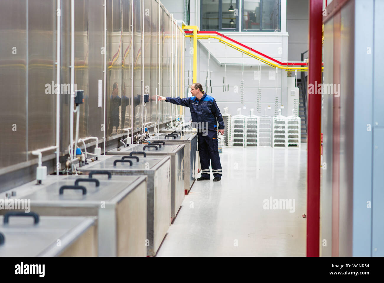 Man operating machines hi-res stock photography and images - Alamy