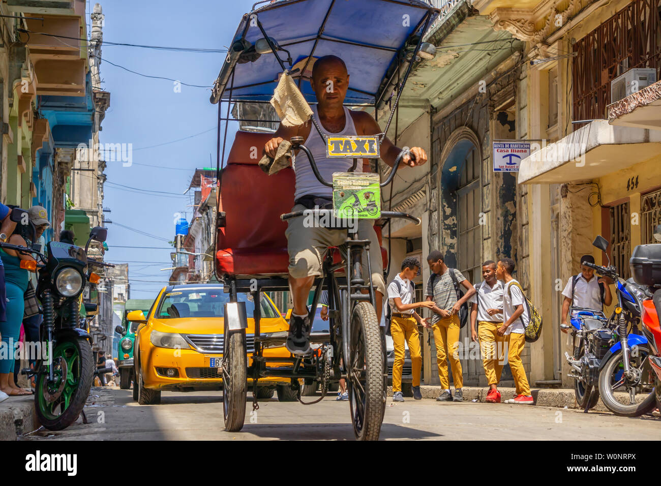 Havana, Cuba - May 16, 2019: Bicycle Taxi Driver in the street of Old ...