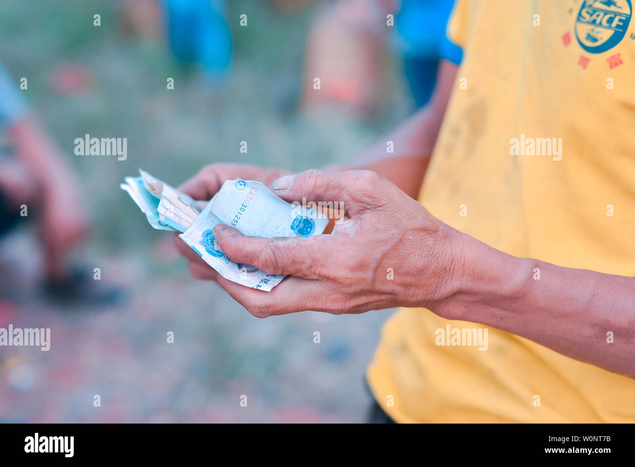 Hard earned money hi-res stock photography and images - Alamy