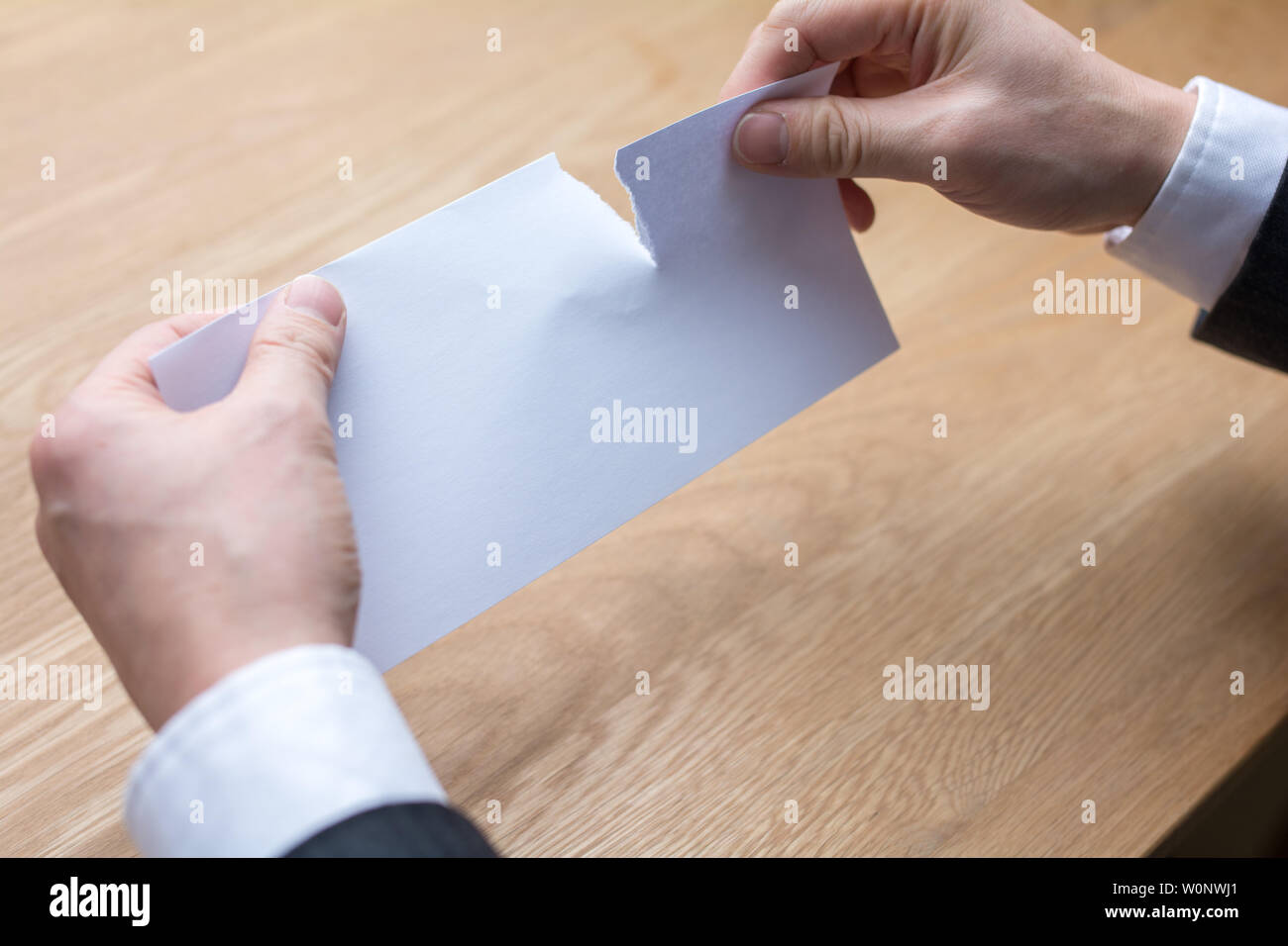 Poster tearing hi-res stock photography and images - Alamy