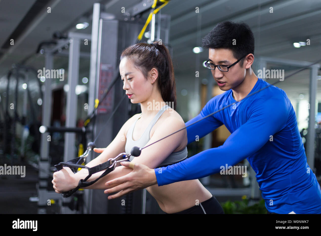 young asian people working out in modern gym Stock Photo - Alamy