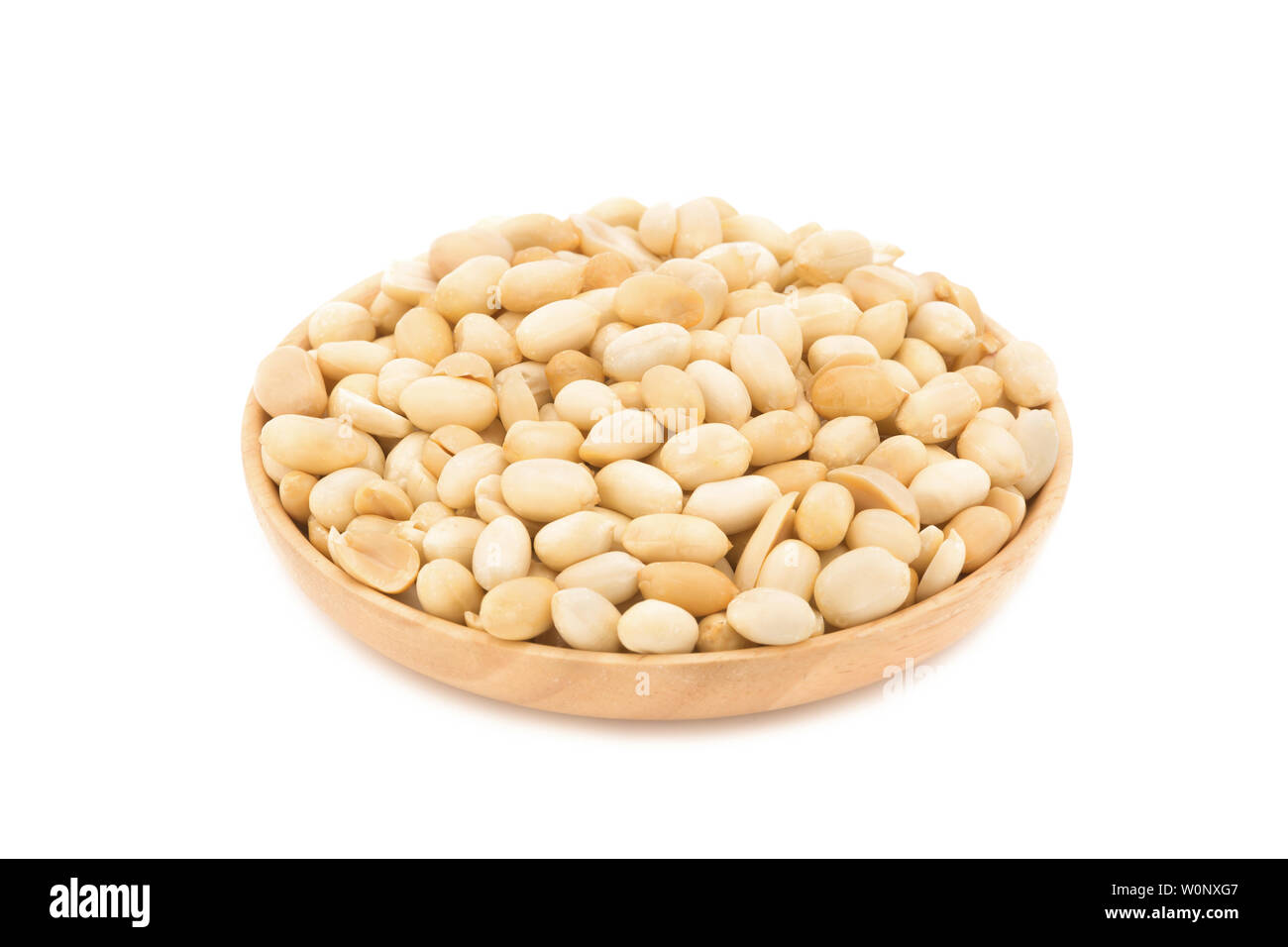 Peeling peanuts on white background Stock Photo - Alamy