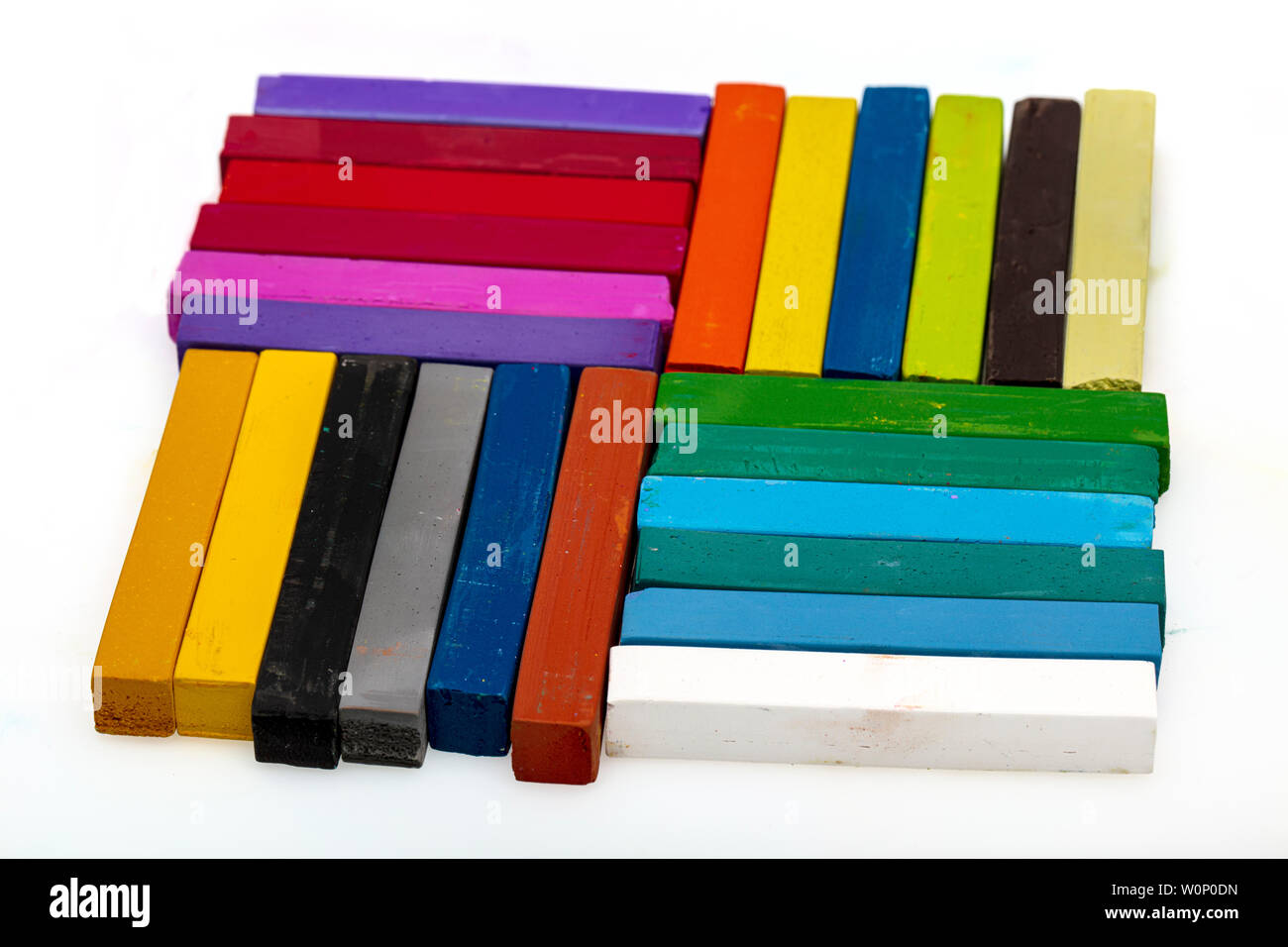 Colored chalks. Square colorful pastel chalks tops closeup, on white ...