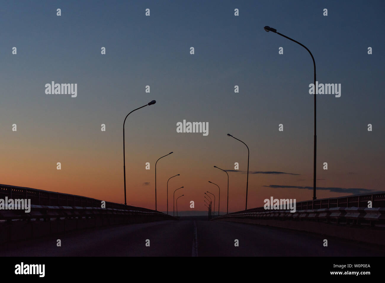 Midnight car track covered with fog Stock Photo - Alamy