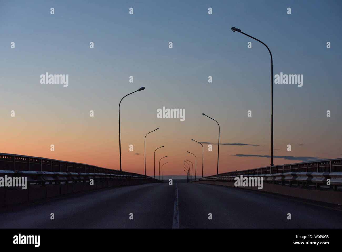 Midnight car track covered with fog Stock Photo - Alamy