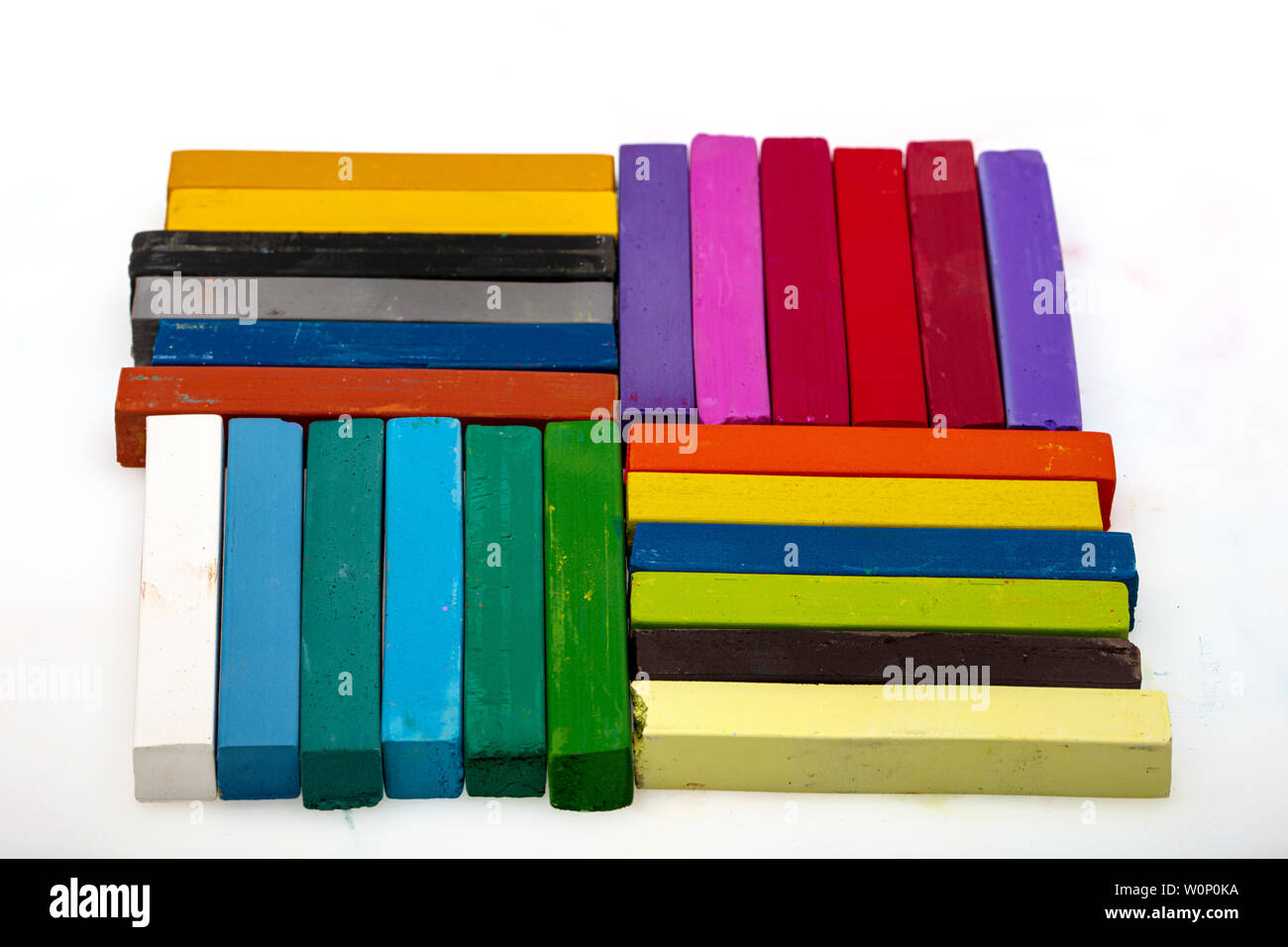 Colored chalks. Square colorful pastel chalks tops closeup, on white ...