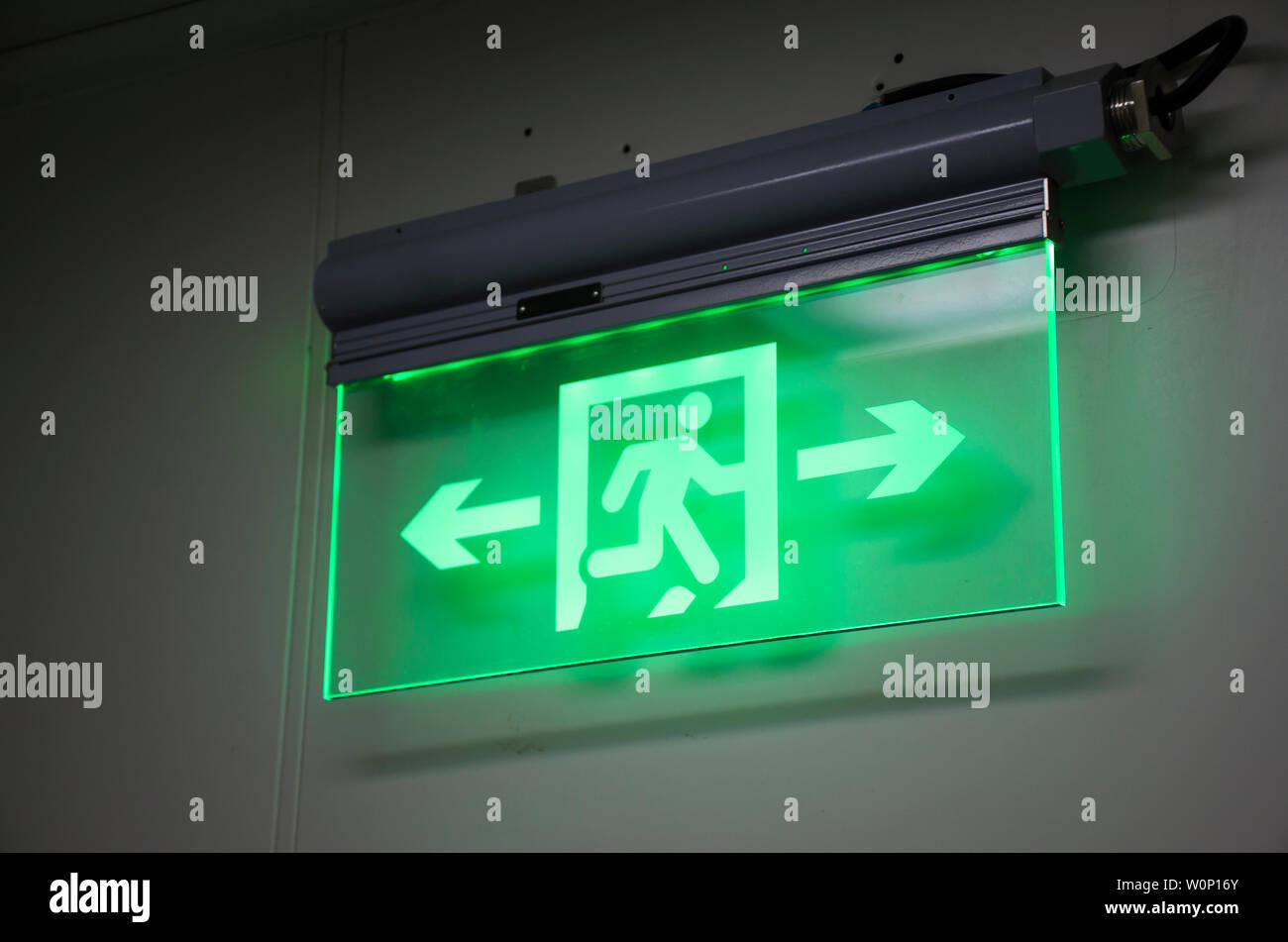 Emergency escape sign Stock Photo - Alamy