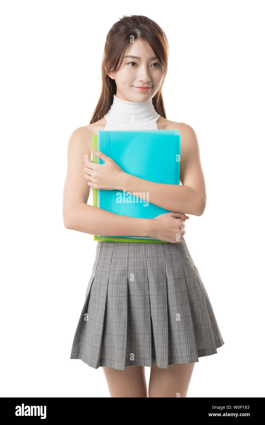Beautiful cute college student against white background Stock Photo - Alamy