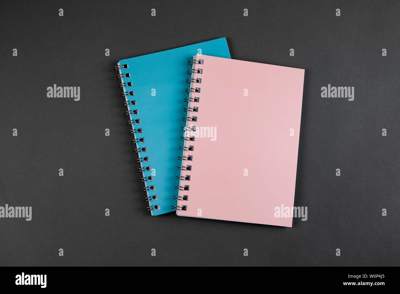 Top view image of the closed notebooks Stock Photo - Alamy