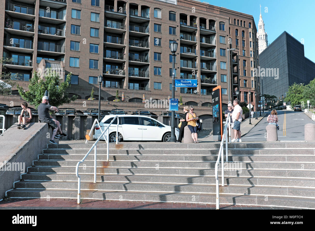 People enjoy the public spaces along the east bank of the Cleveland ...