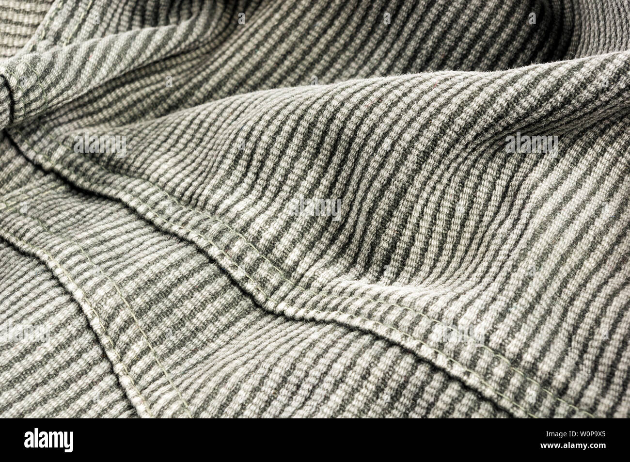 clothing items washed cotton fabric texture with seams, clasps, buttons ...